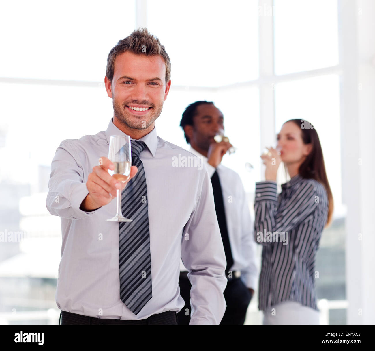 Businessman drinking champagne and celebrating a success Stock Photo ...