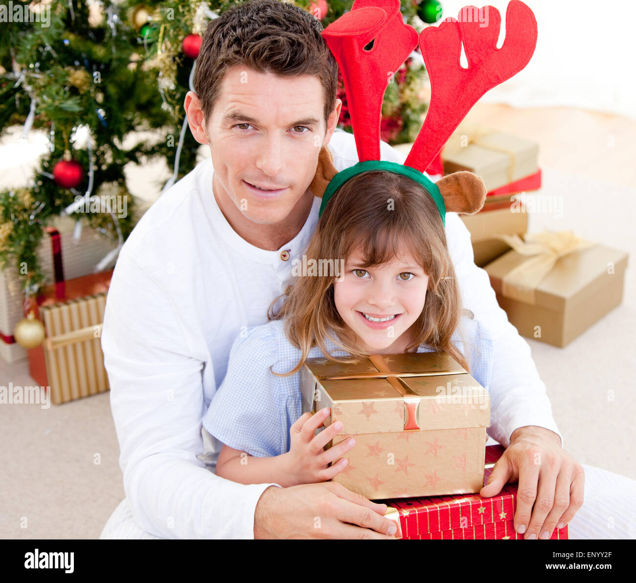 Handsome father celebrating christmas with his daughter Stock Photo - Alamy