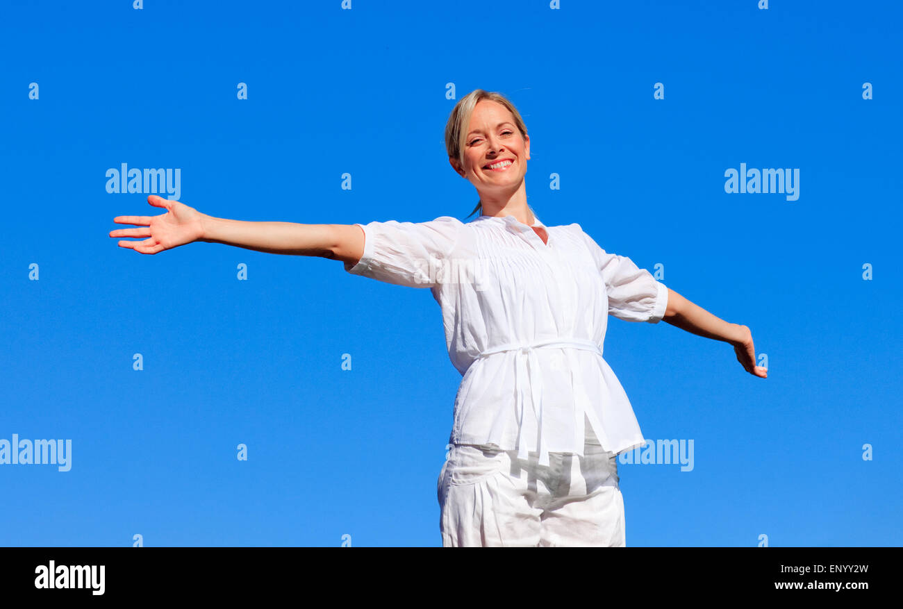 Young woman with open arms Stock Photo - Alamy