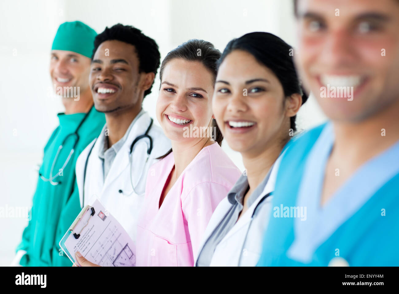 Smiling medical team in a line Stock Photo - Alamy