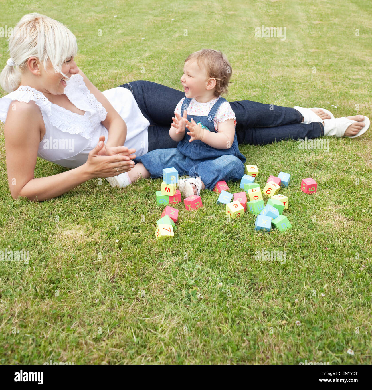 Laughing mother and child Stock Photo - Alamy
