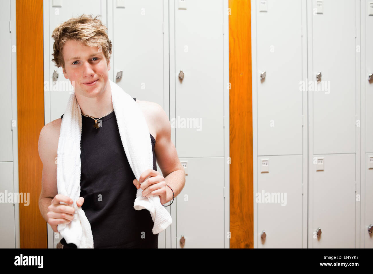 Handsome sports student posing Stock Photo - Alamy