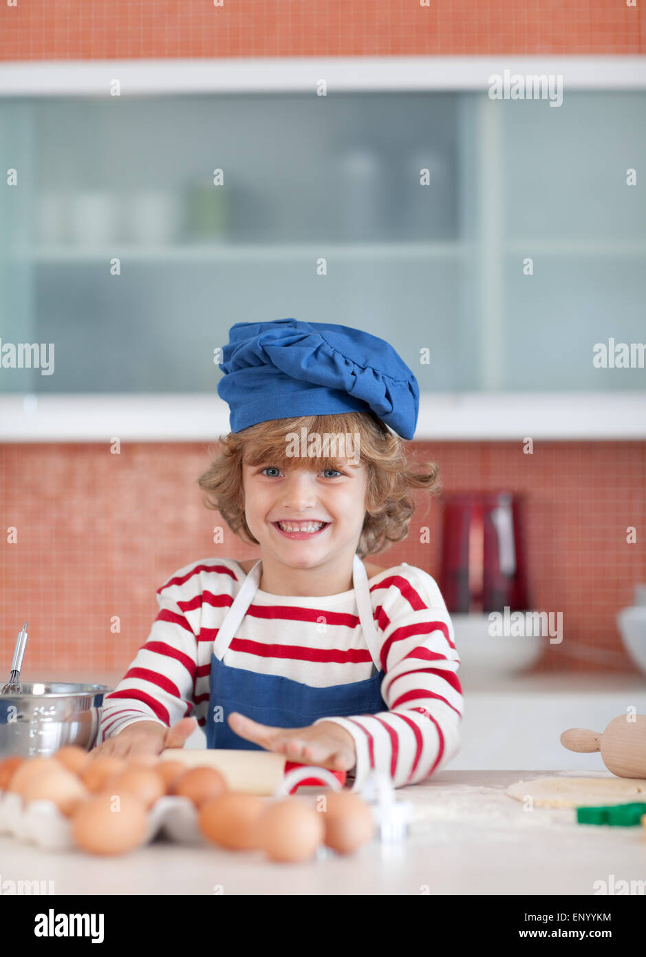 Happy boy with blue cap Stock Photo - Alamy