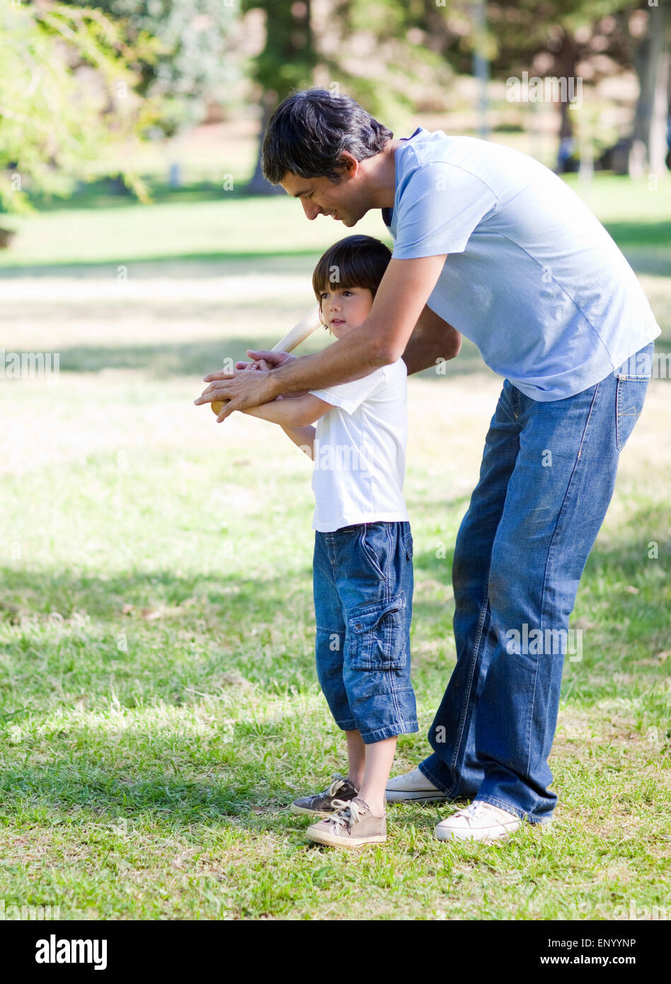 Loving little boy playing baseball with his father Stock Photo - Alamy