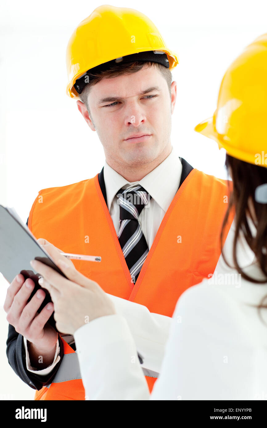 Self-assured architect discussing with his colleague Stock Photo - Alamy Self-assured architect discussing with his colleague Stock Photo - Alamy
