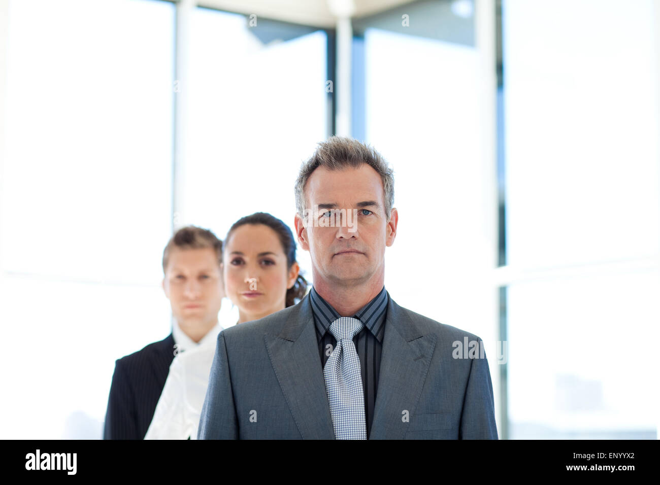 Manager leading a business team Stock Photo - Alamy