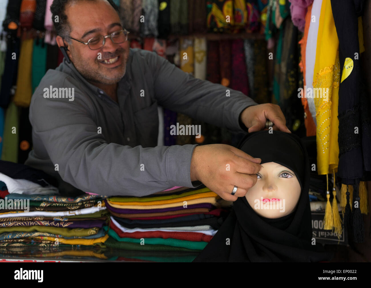 Iran, Fars Province, Shiraz, Man Putting A Veil On A Mannequin In The ...