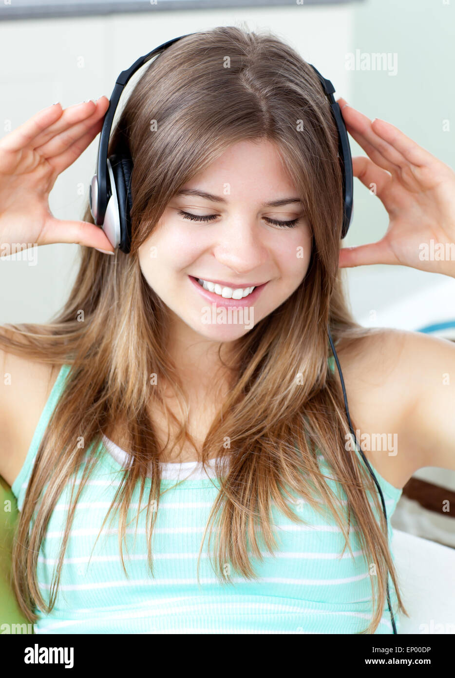 Good-looking girl listening to music Stock Photo - Alamy