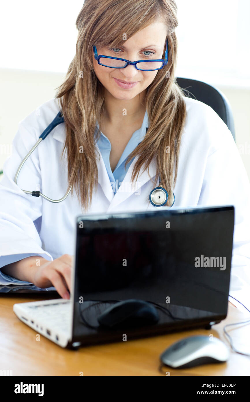 Delighted female doctor working Stock Photo - Alamy