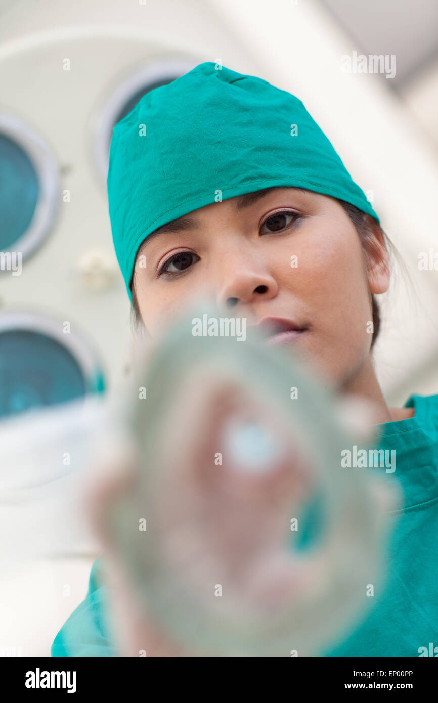 Doctor applying oxygen mask hi-res stock photography and images - Alamy
