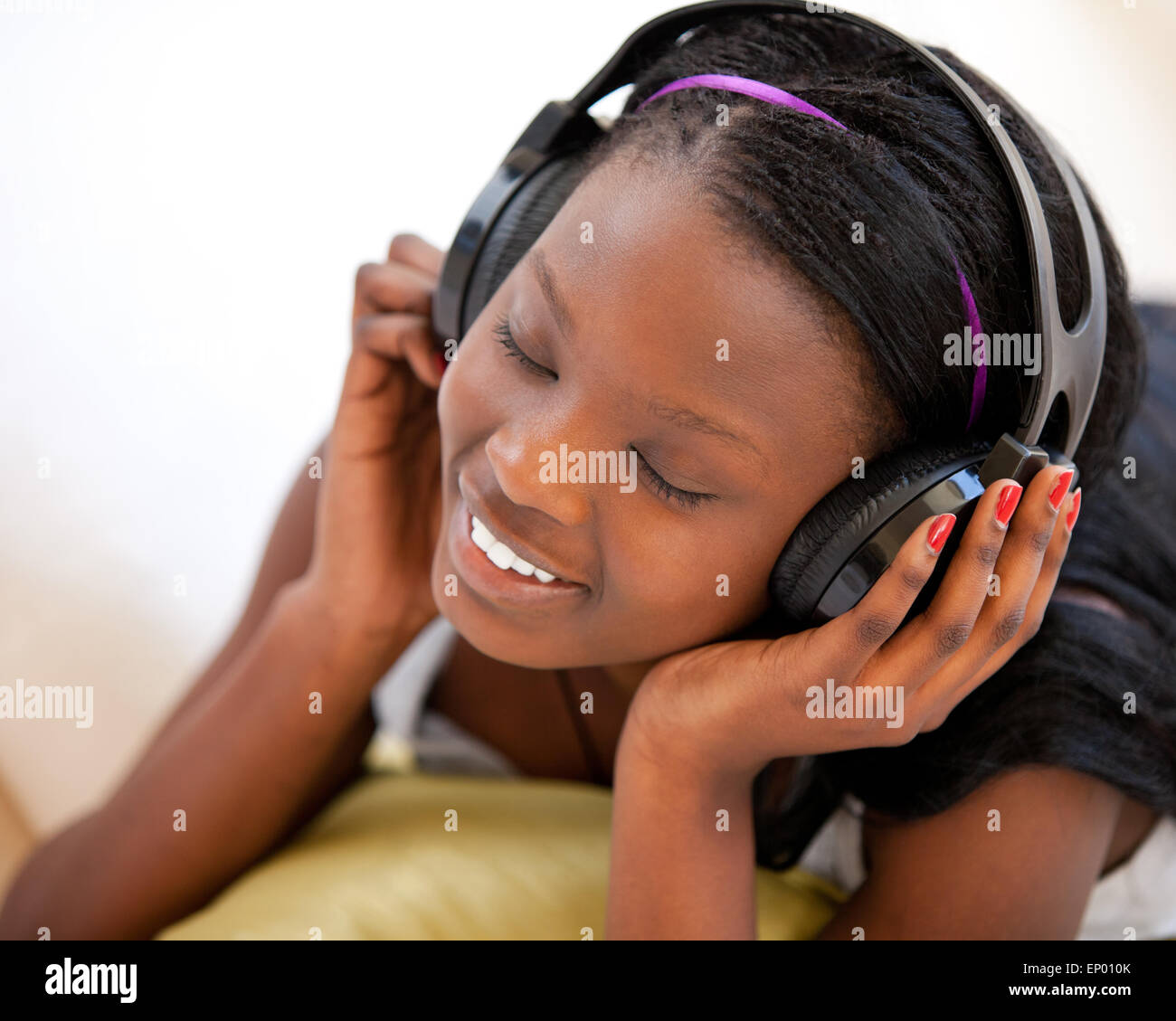 Kind woman listening to music Stock Photo - Alamy
