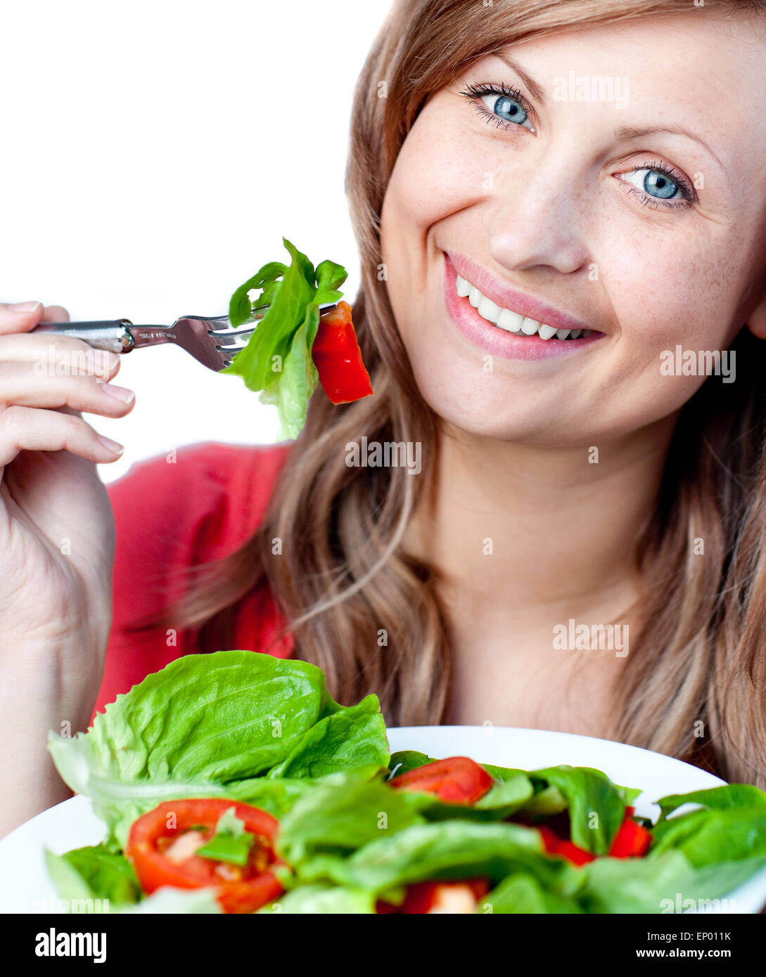 Glad woman eating healthy salad hi-res stock photography and images - Alamy