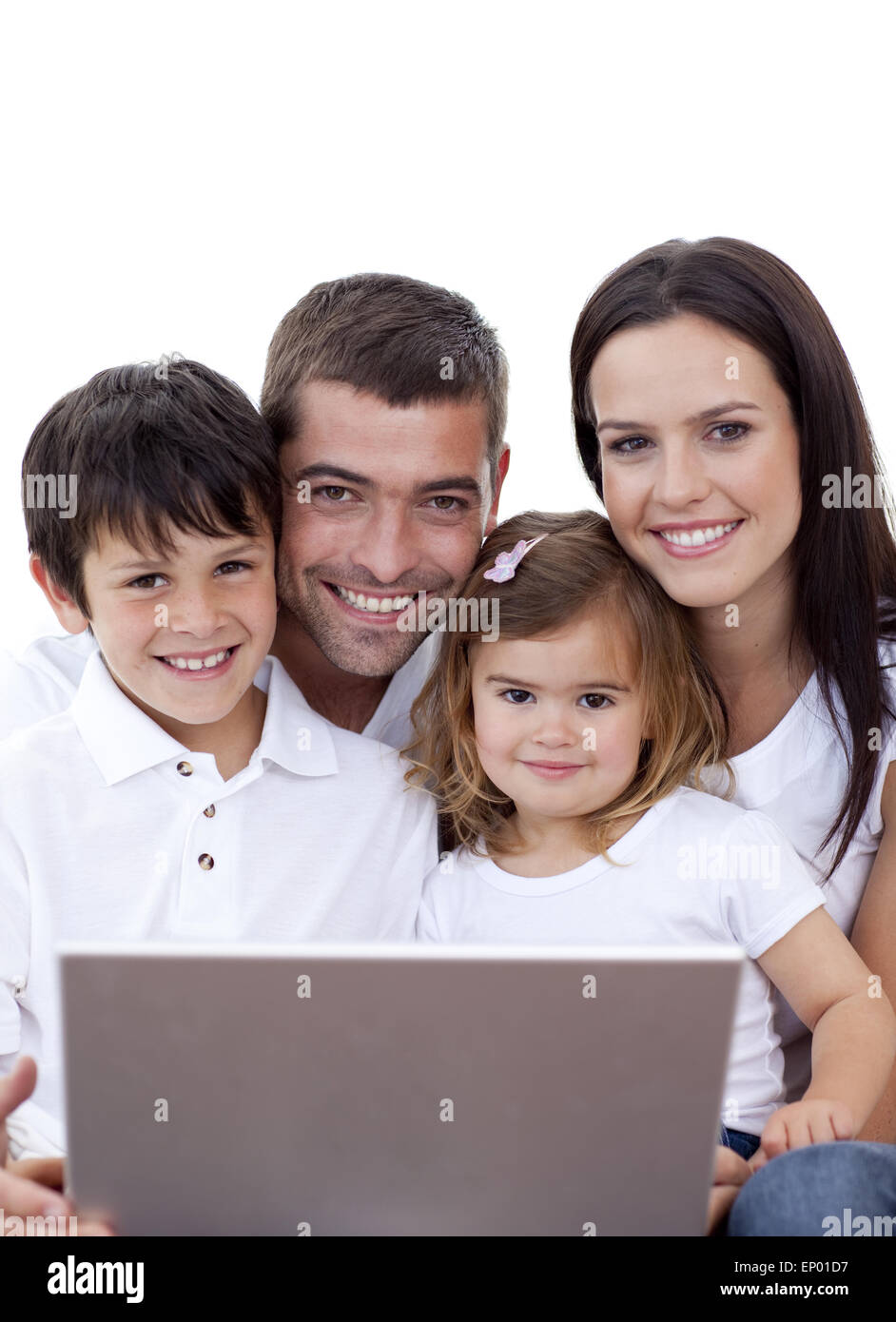 Portrait of young family using a laptop at home Stock Photo - Alamy