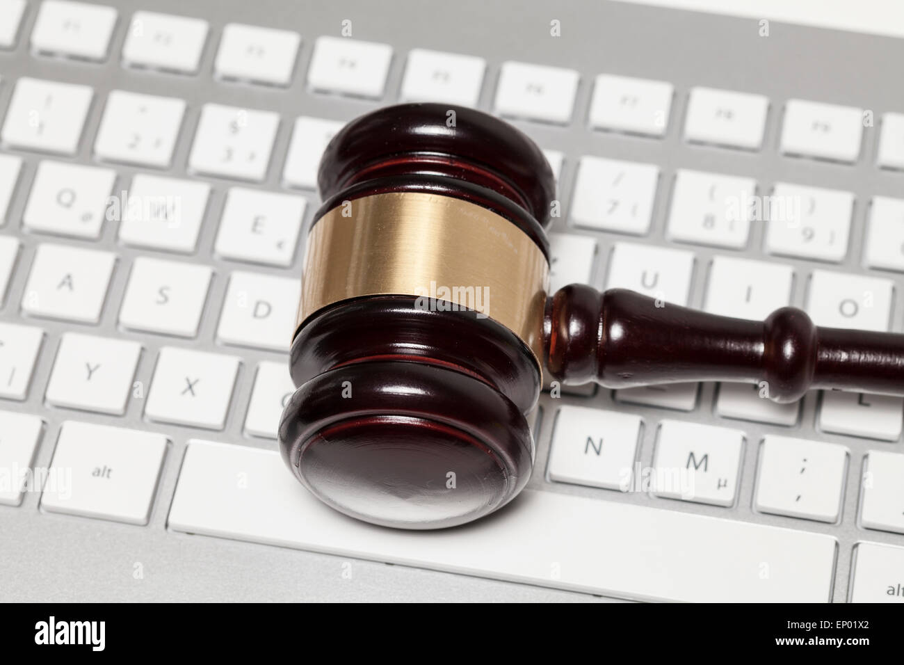 Wooden hammer on keyboard Stock Photo - Alamy