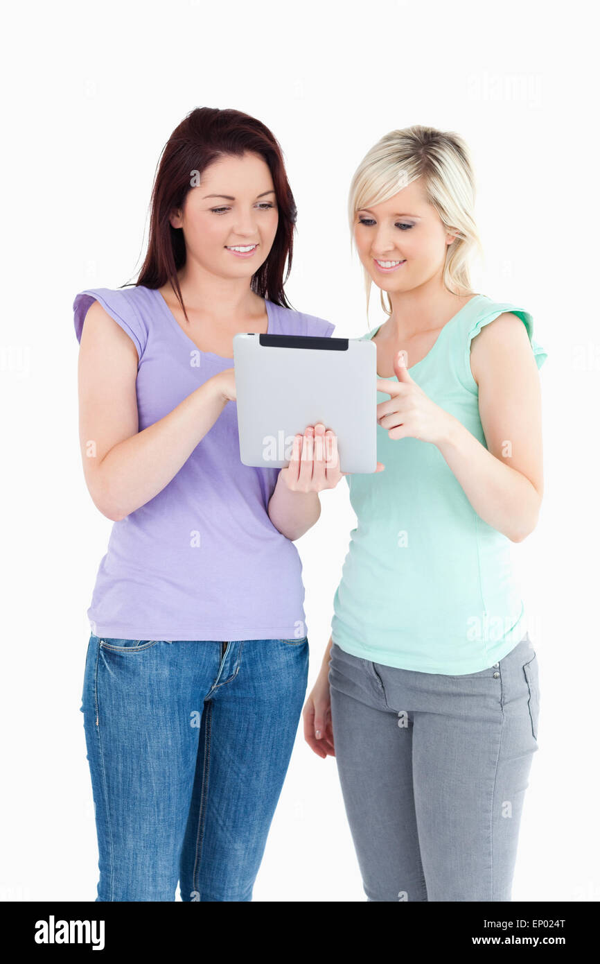 Two smiling people tablet Cut Out Stock Images & Pictures - Alamy