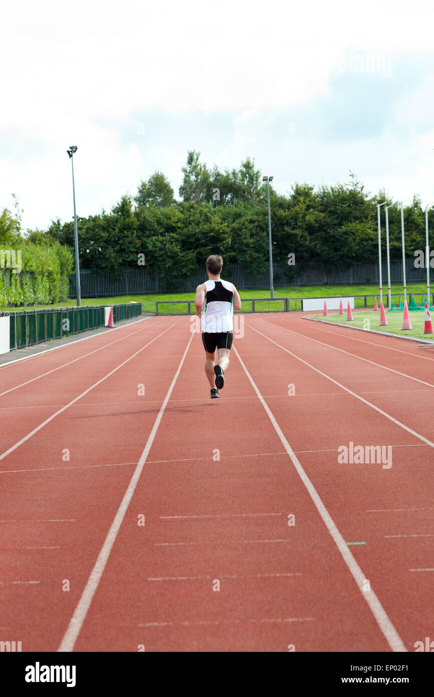 Concentrated male sprinter training Stock Photo - Alamy