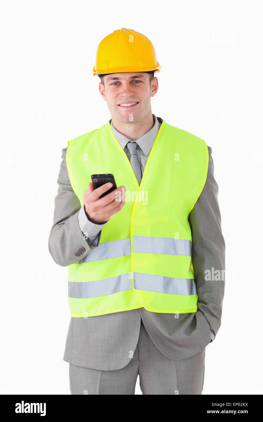 Portrait of a young builder holding his cellphone Stock Photo - Alamy