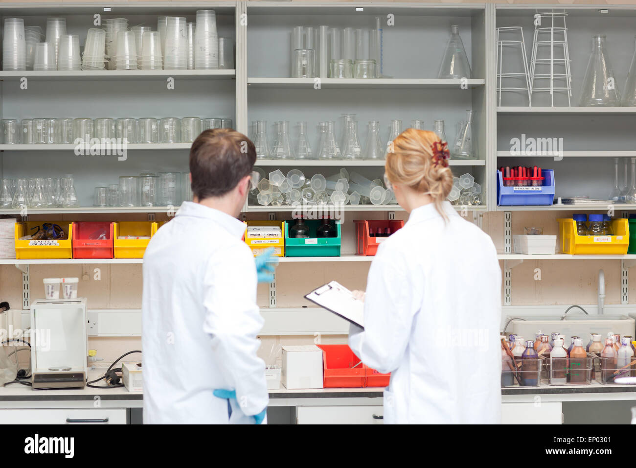 Concentrated scientists thinking in their laboratory Stock Photo - Alamy