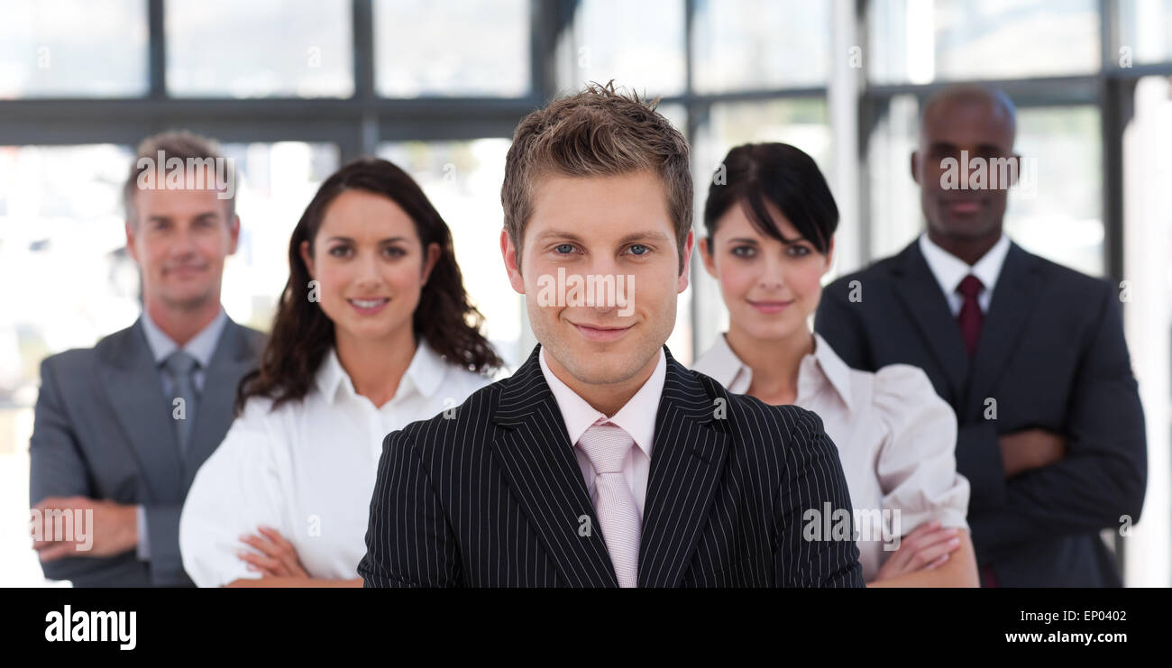 Serious business team looking at the camera Stock Photo - Alamy