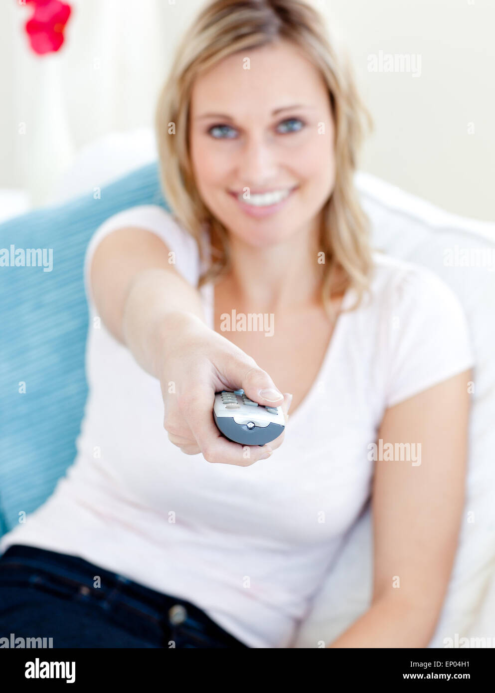 Good-looking woman watching TV Stock Photo - Alamy