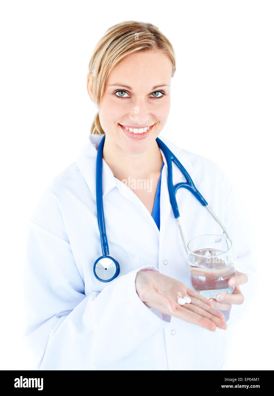 Pretty female doctor holding pills and water against white background ...