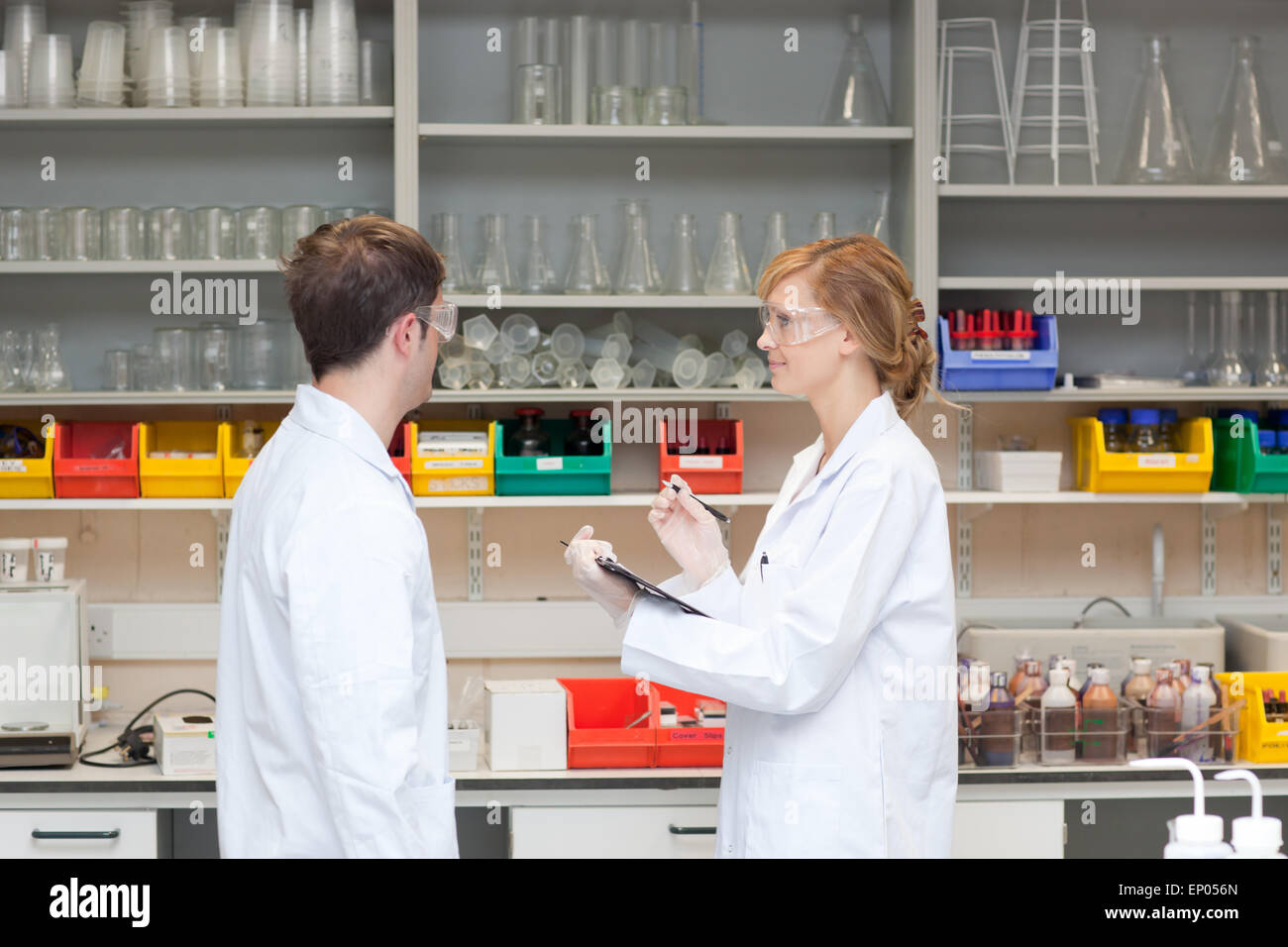 Serious scientists thinking Stock Photo - Alamy