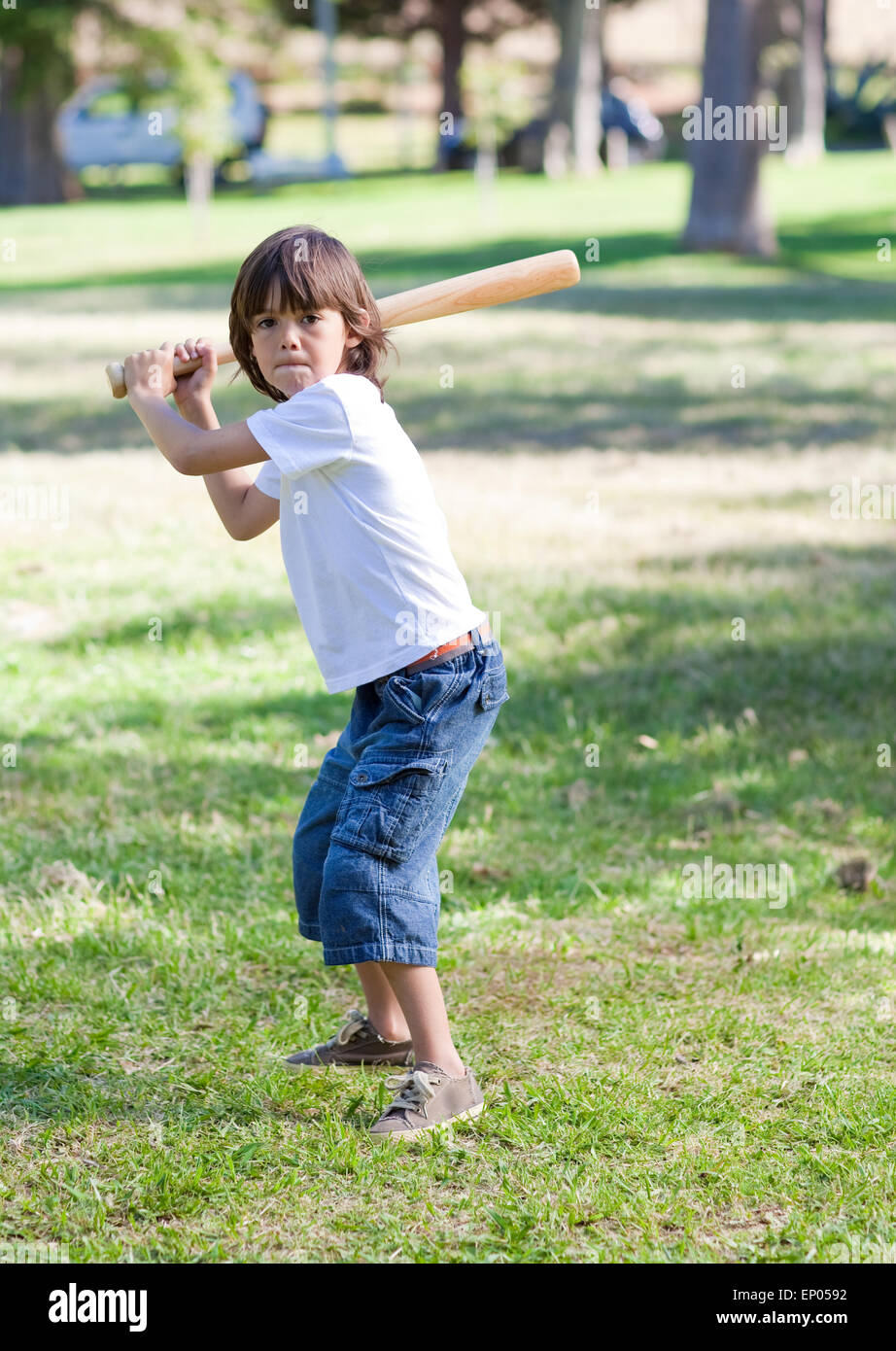 Cute little boy playing baseball Stock Photo - Alamy