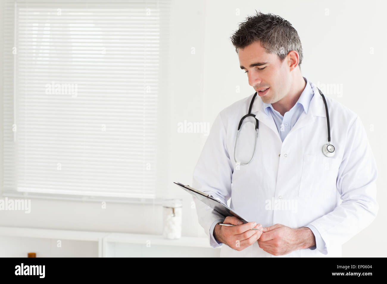 Two people looking at a chart hi-res stock photography and images - Alamy