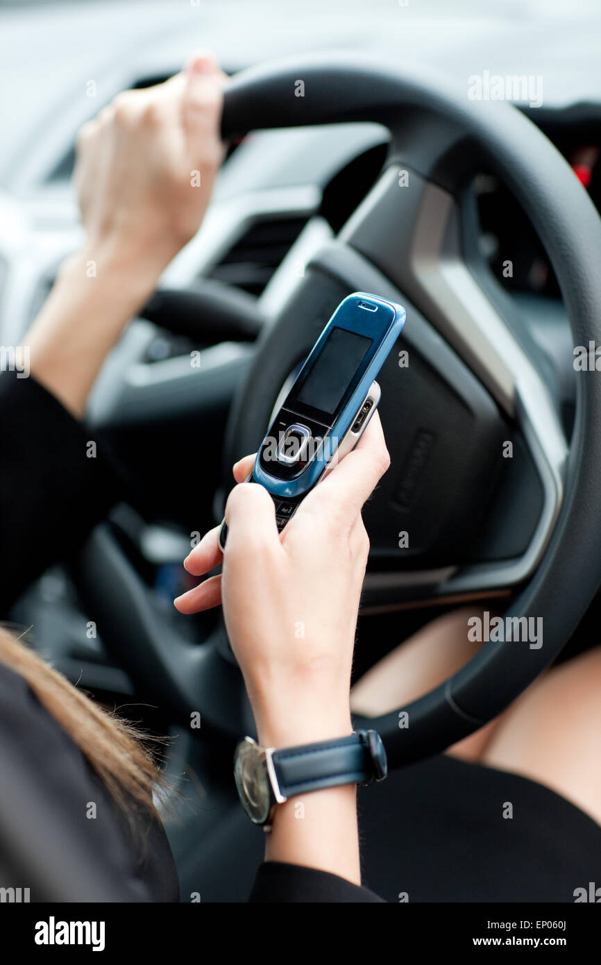 Sending email while driving hi-res stock photography and images - Alamy