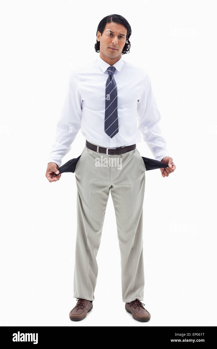 Portrait of a broke businessman showing his empty pockets Stock Photo ...