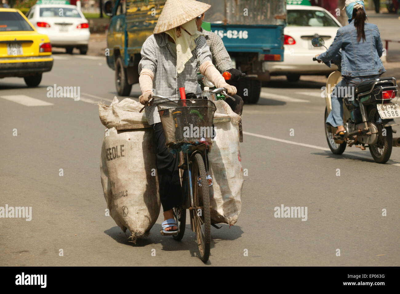 Everyday scene in the city of Hanoi in Vietnam Stock Photo - Alamy