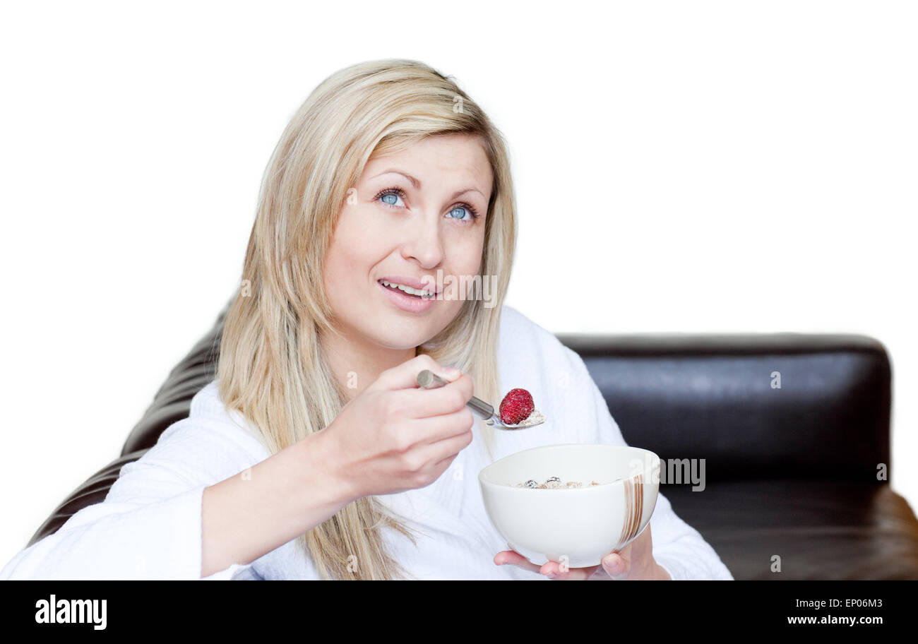 Beautiful woman having a breakfast against a white background Stock ...