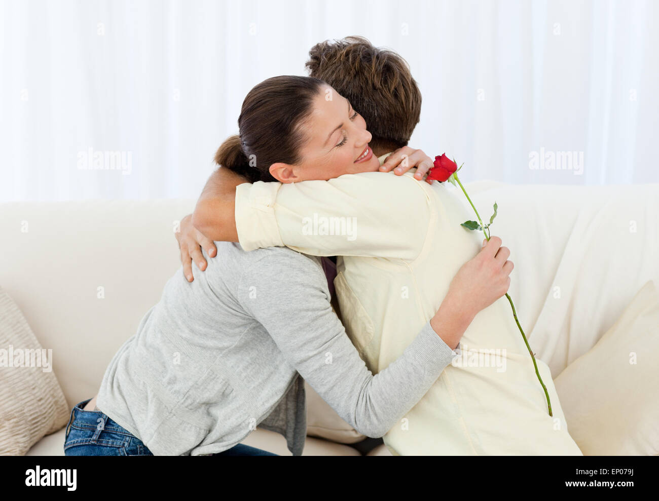 Rose flower gift present hugging hi-res stock photography and images ...