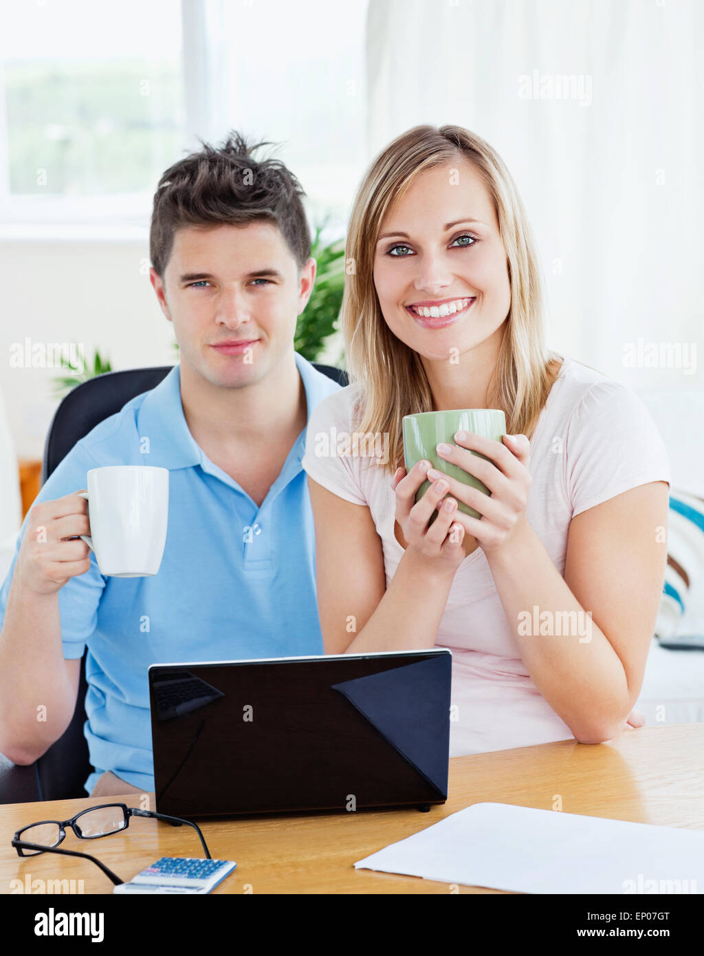 Couple having tea break Stock Photo - Alamy