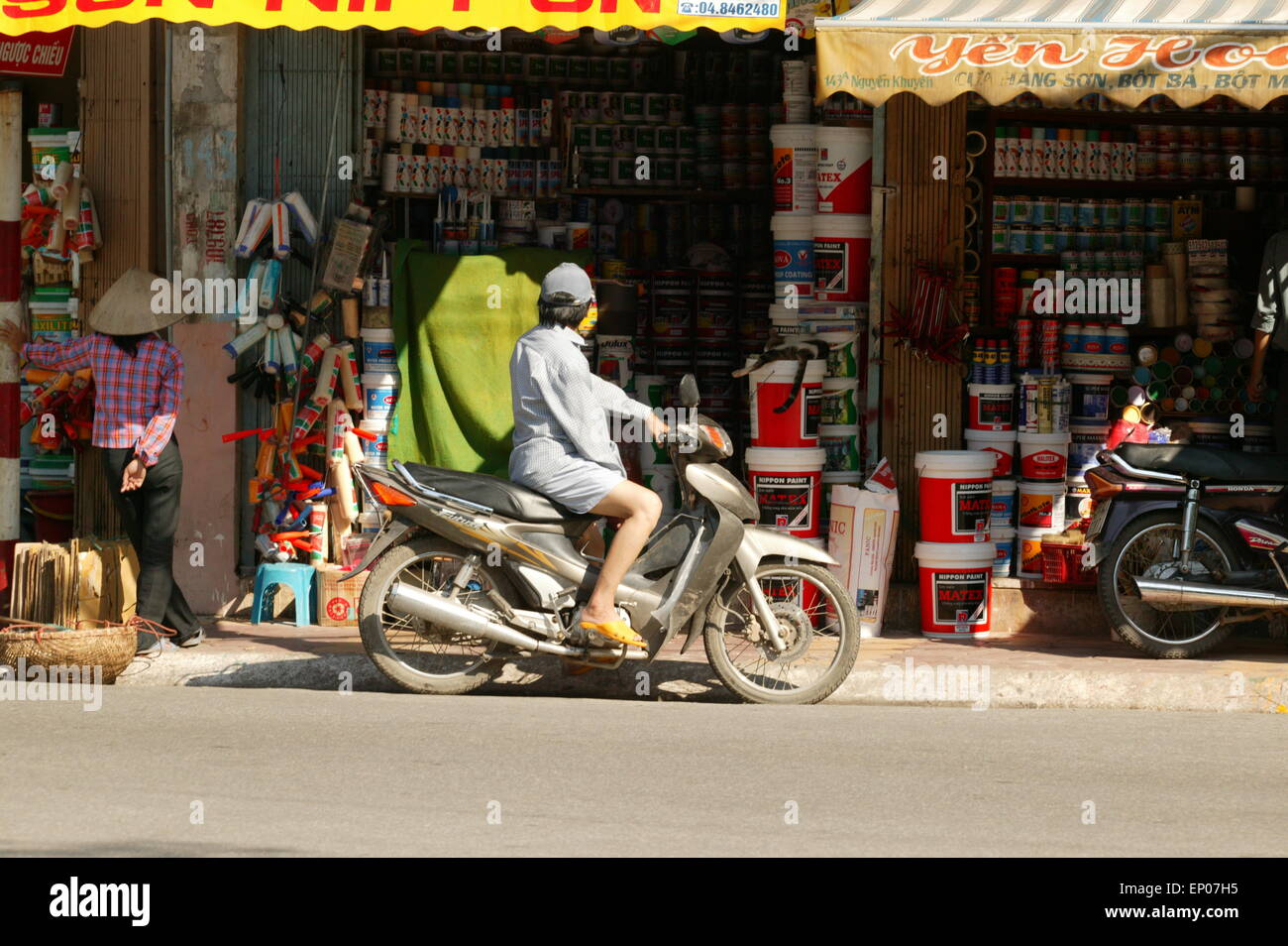 Everyday scene in the city of Hanoi in Vietnam Stock Photo - Alamy