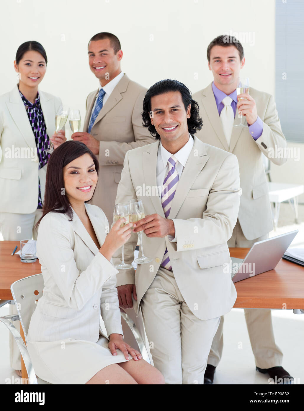 Happy business team celebrating a success Stock Photo - Alamy