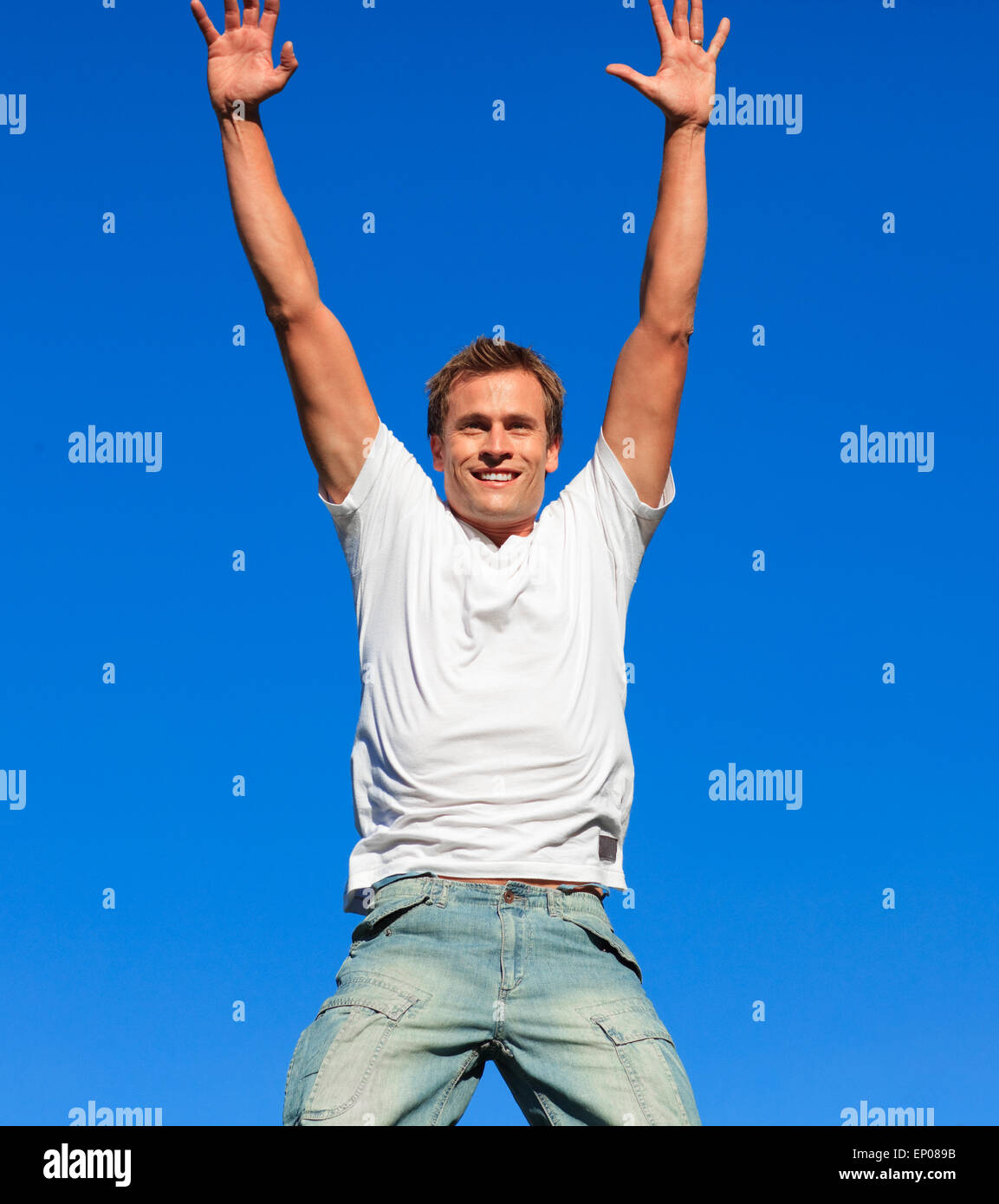 Happy Man jumping in the air outdoor Stock Photo - Alamy