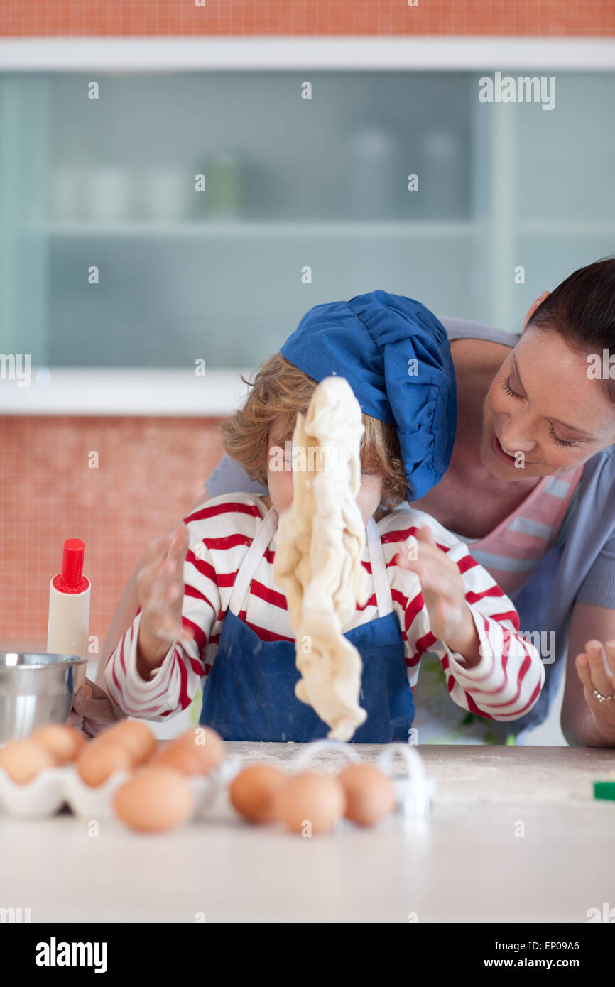 Young child baking in the kitchen Stock Photo - Alamy