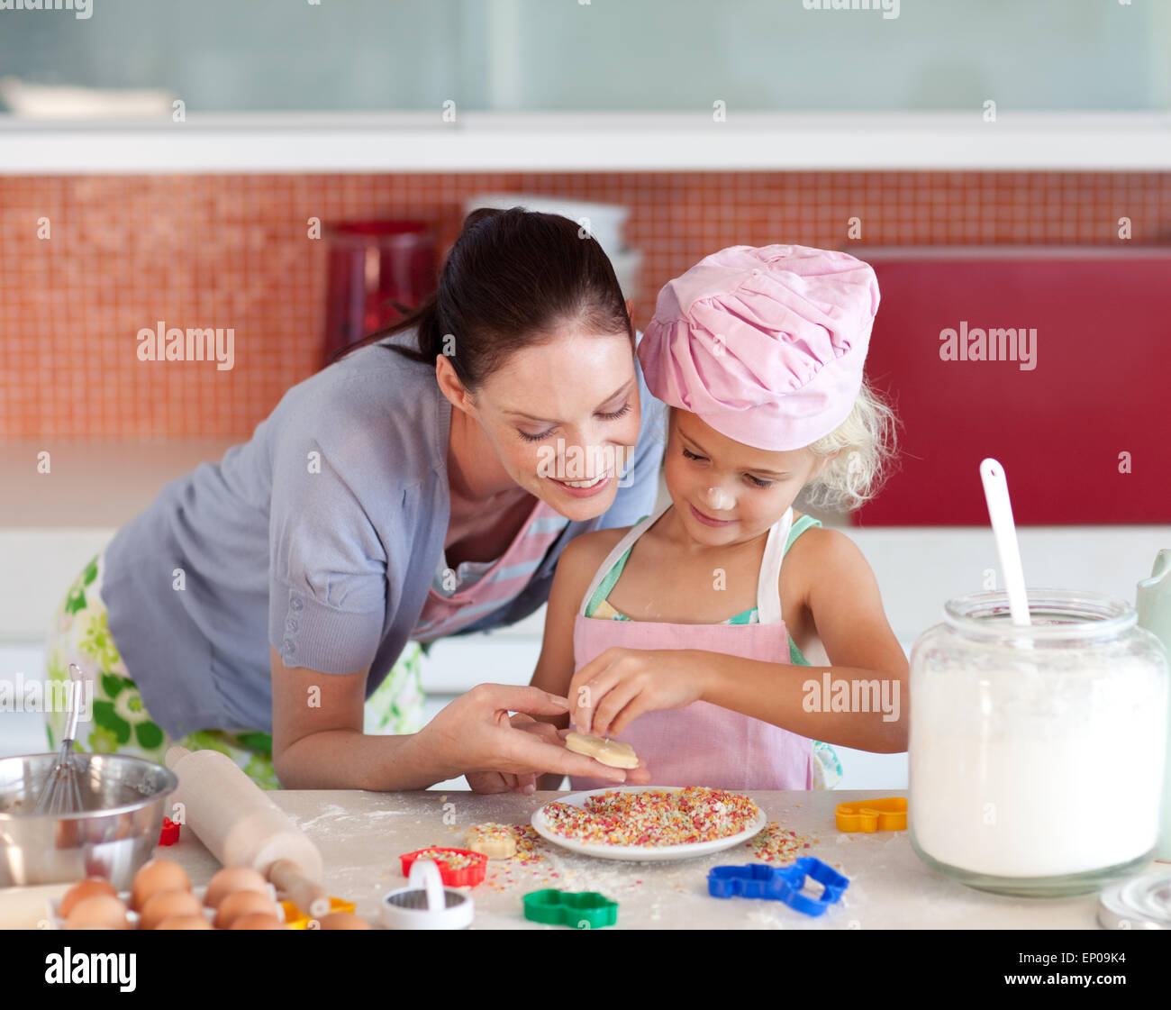 Young mother teaching child how to cook Stock Photo - Alamy