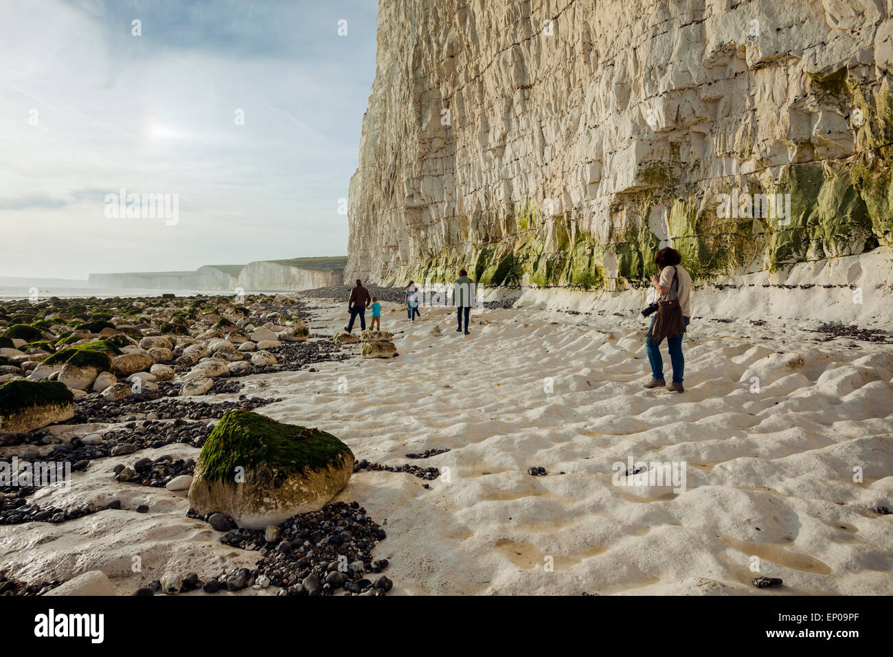 White cliffs of Beachy Head, Sussex, England. Seven Sisters looming in ...
