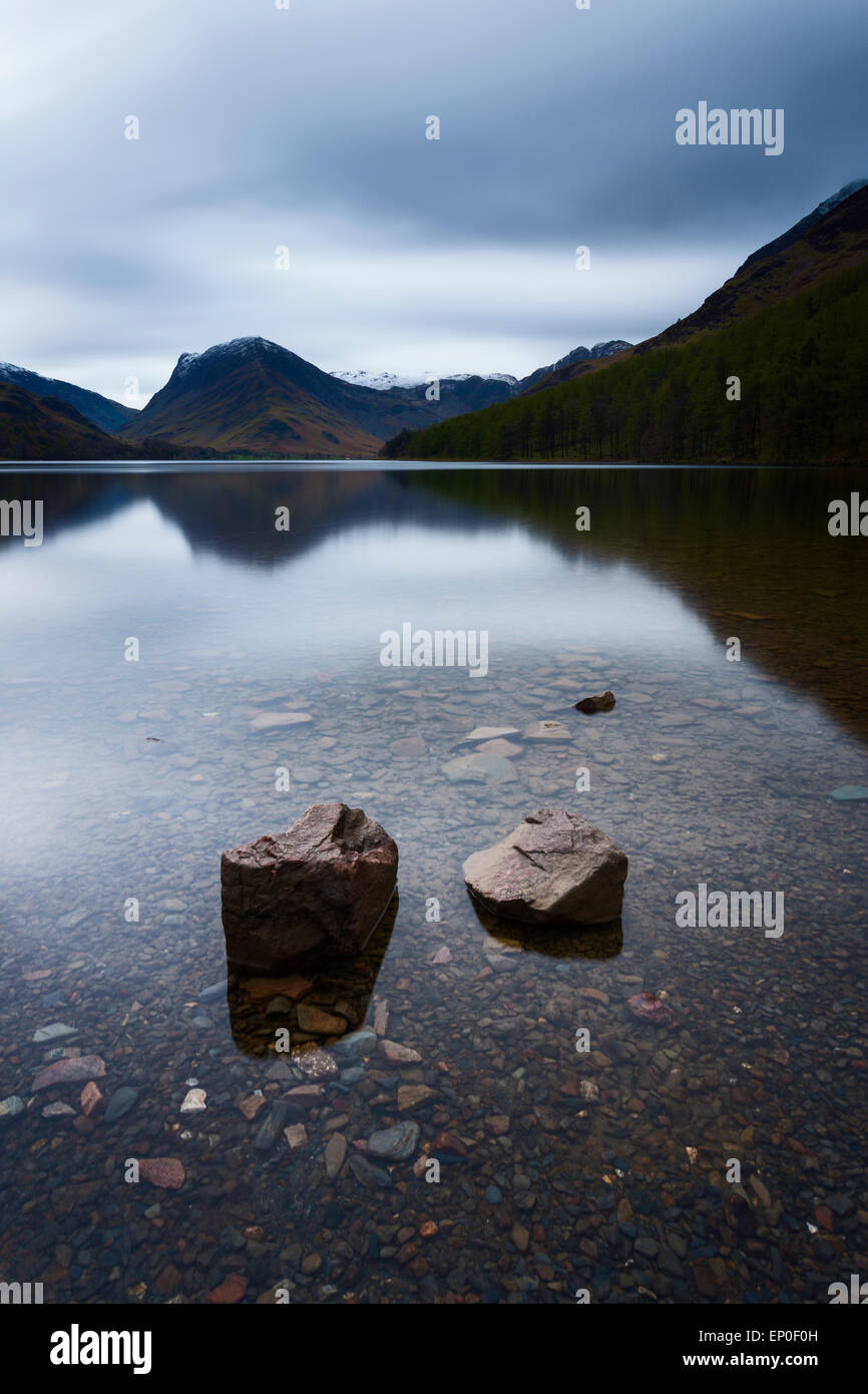 Fleetwith Pike reflected in a calm Buttermere, the English lake ...