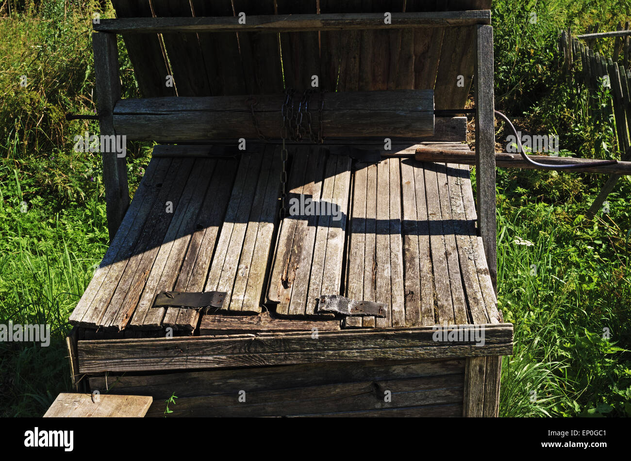 Wooden village well Stock Photo - Alamy