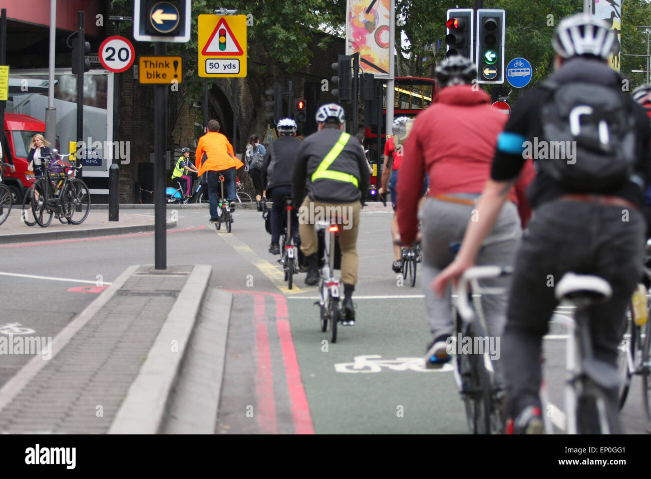 A line of cyclists on the road at Waterloo, London, England Stock Photo ...