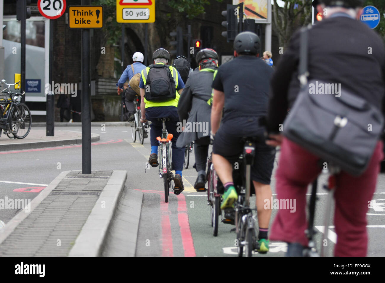 A line of cyclists on the road at Waterloo, London, England Stock Photo ...