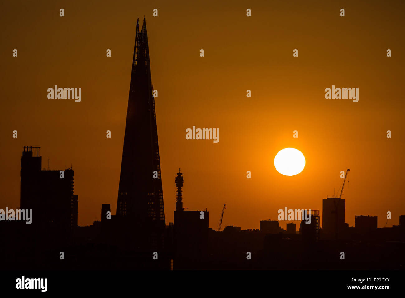 London, UK. 12th May, 2015. Sunset behind The Shard Building Credit ...