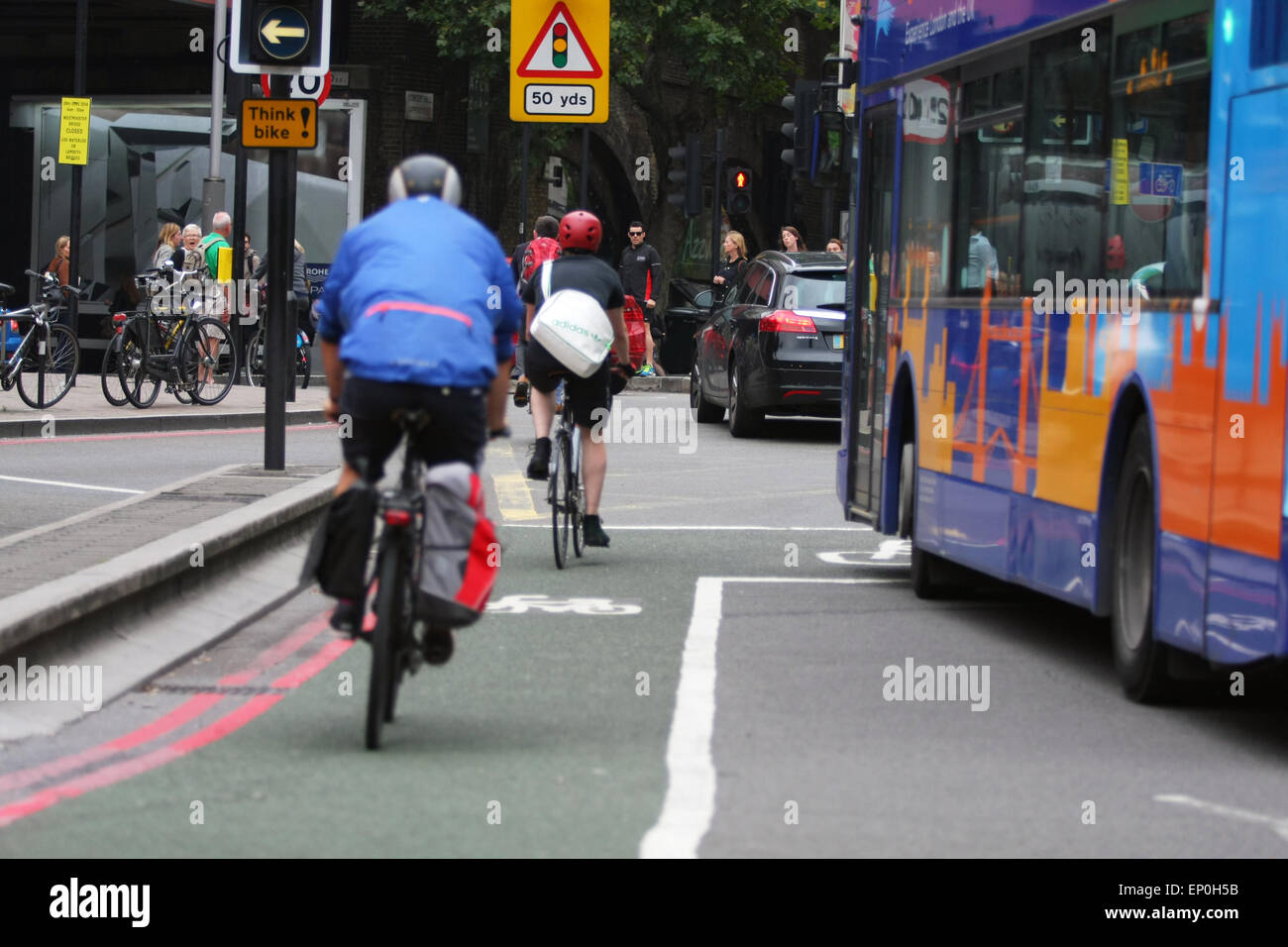 Busy road junction uk cars cyclist bus hi-res stock photography and ...