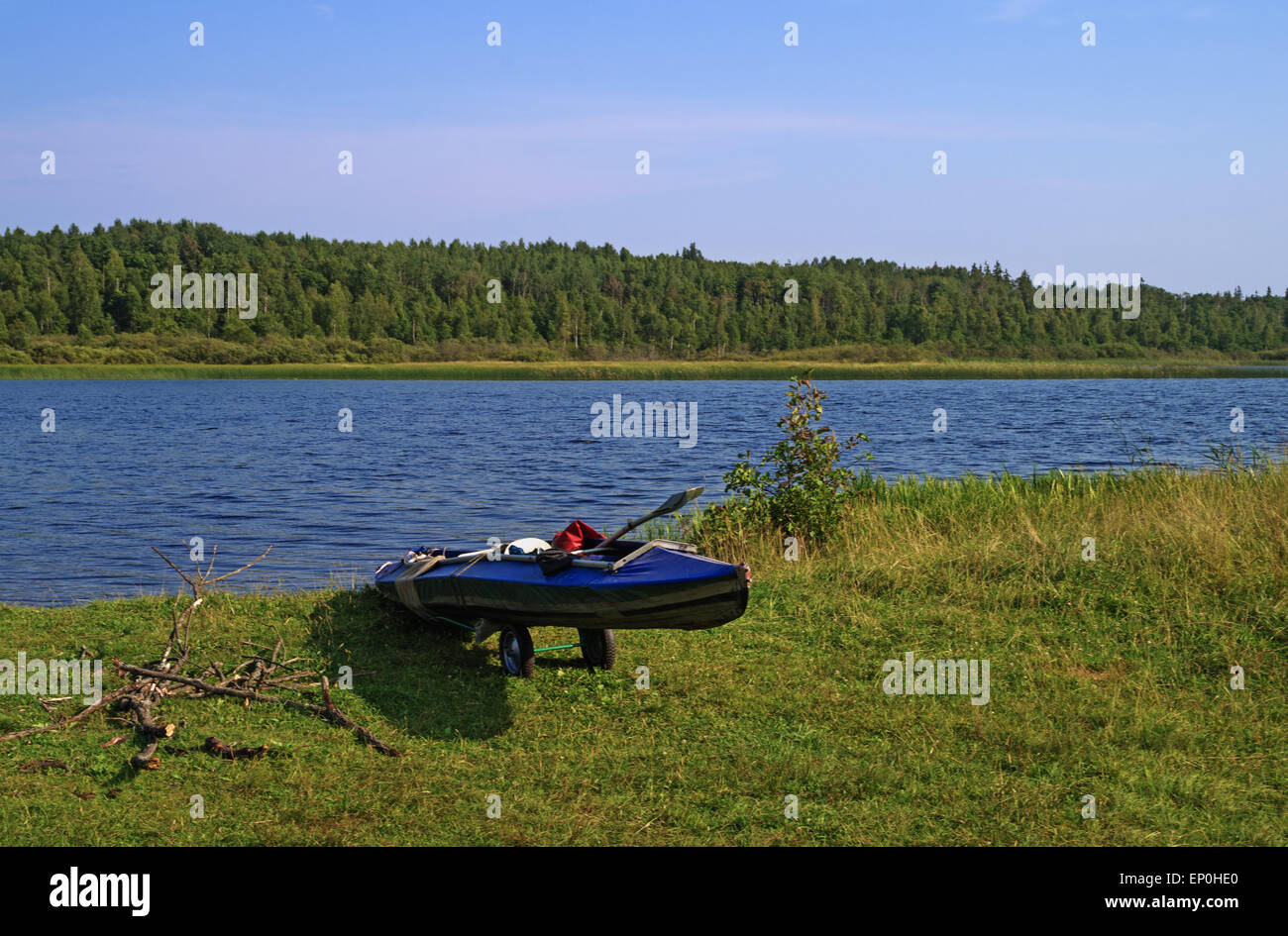 Canoe transportation on the cart on the road to the lake Stock Photo ...