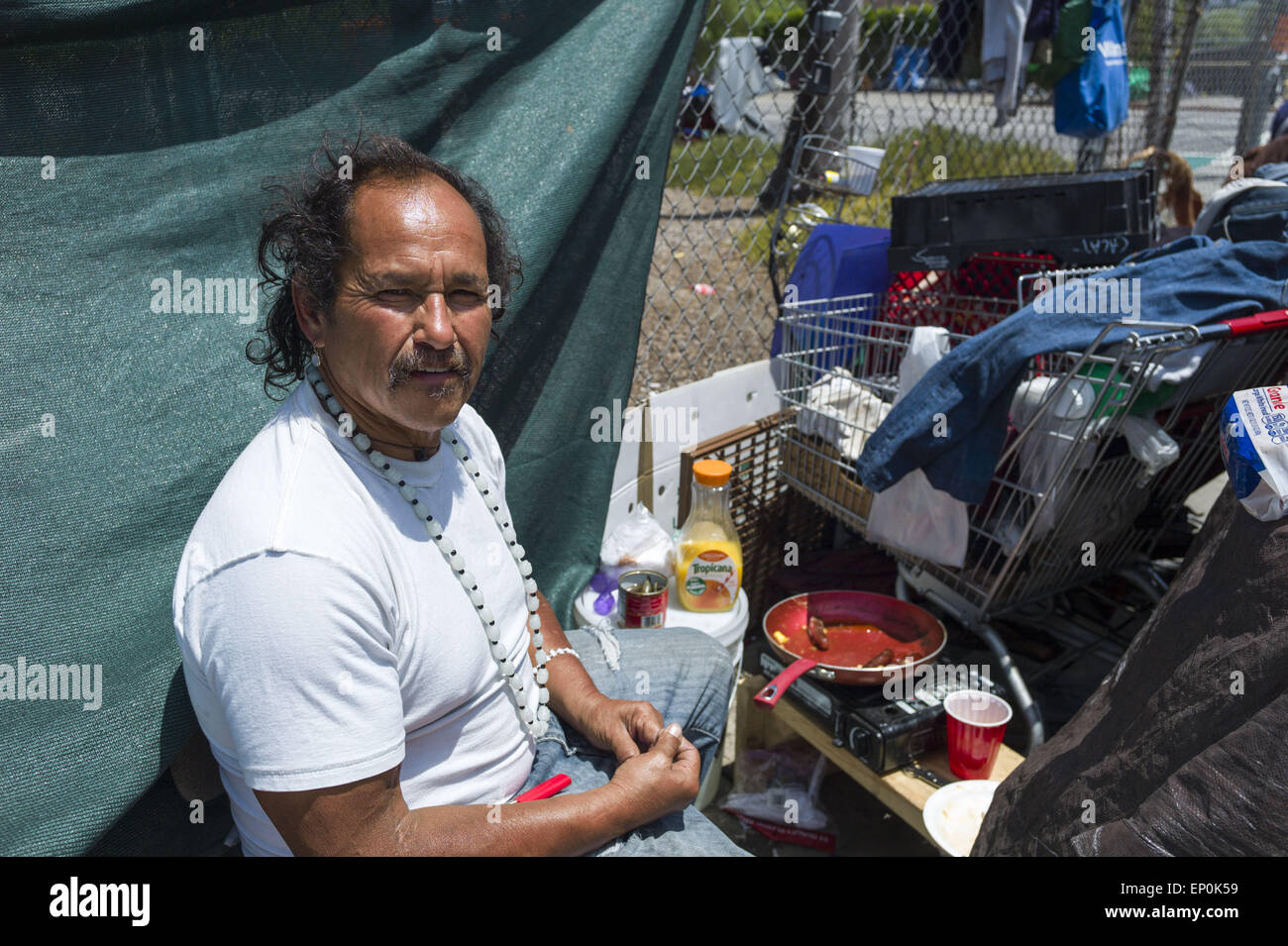 Los Angeles, California, USA. 12th May, 2015. A homeless man is seen in ...