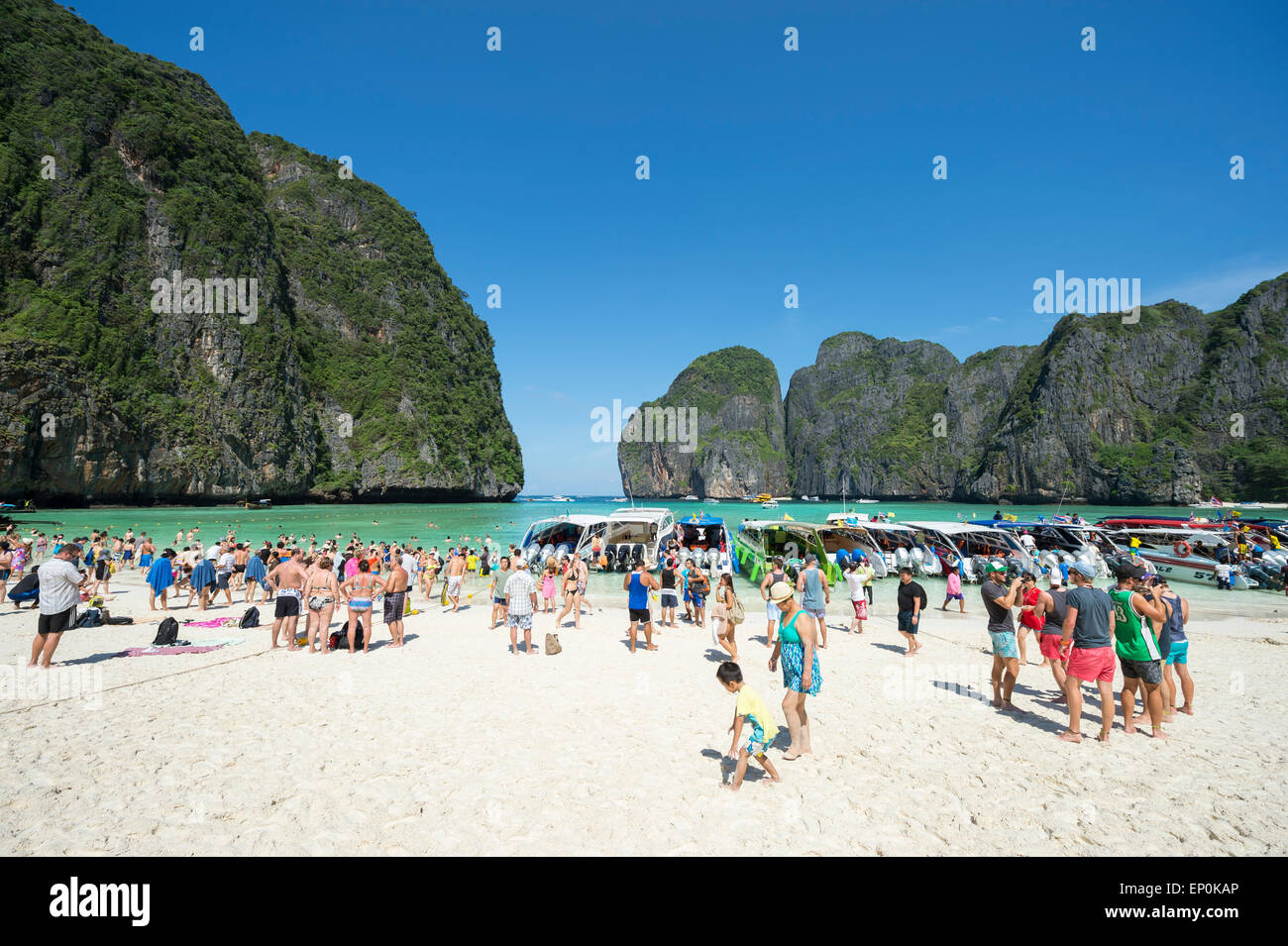 MAYA BAY, THAILAND - NOVEMBER 12, 2014: Crowds of sunbathing visitors ...
