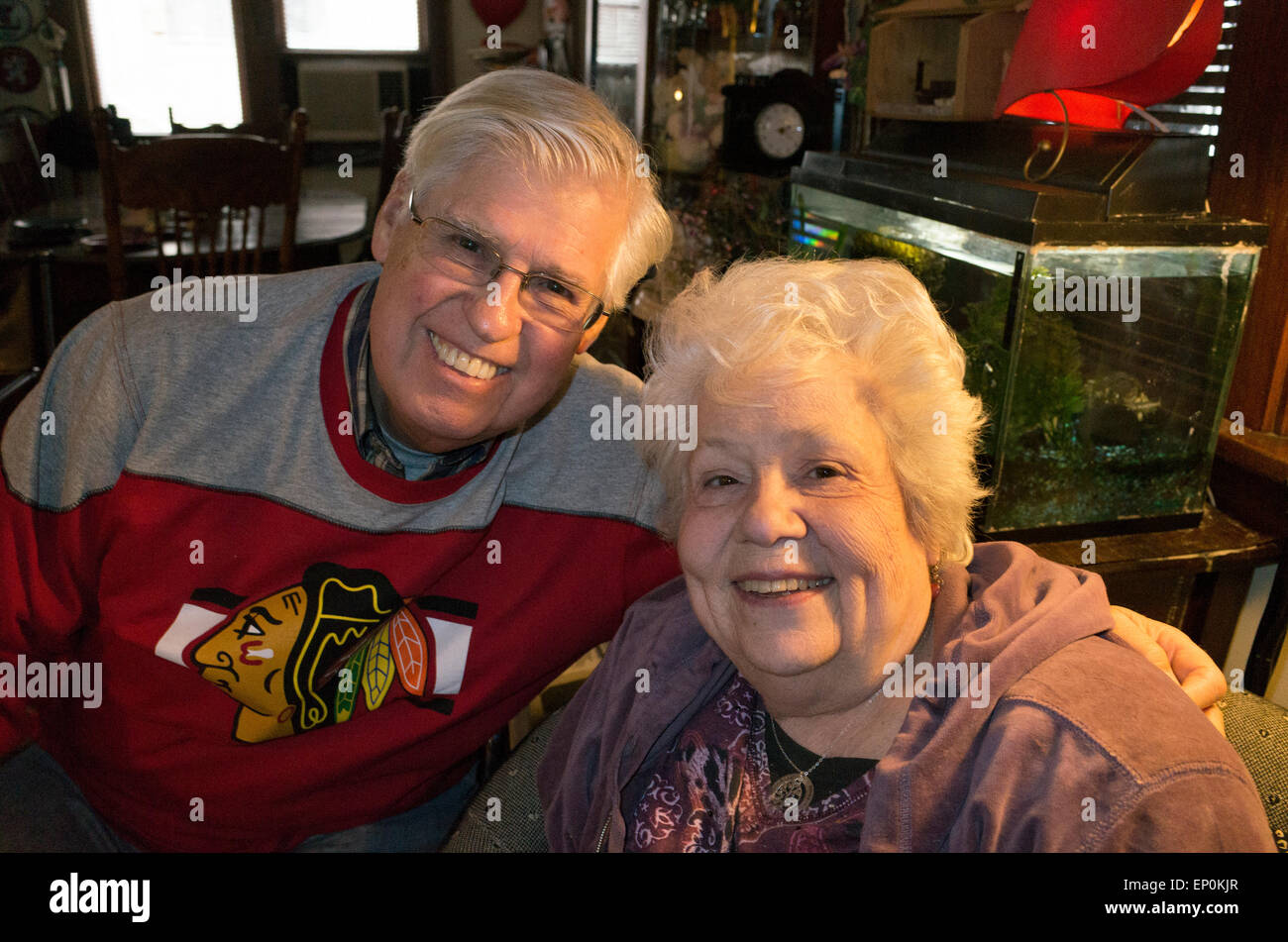 Senior male age 79 wearing a Chief Illiniwek sweatshirt a symbol of the ...